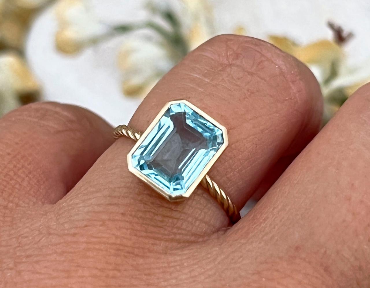 Solid Gold Solitaire Engagement Ring With Emerald Cut Blue Topaz, 18k ...
